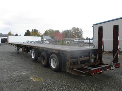1993 UTILITY TRI-AXLE STEEL FLATBED WITH FORKLIFT CARRIER SET U Flatbed ...