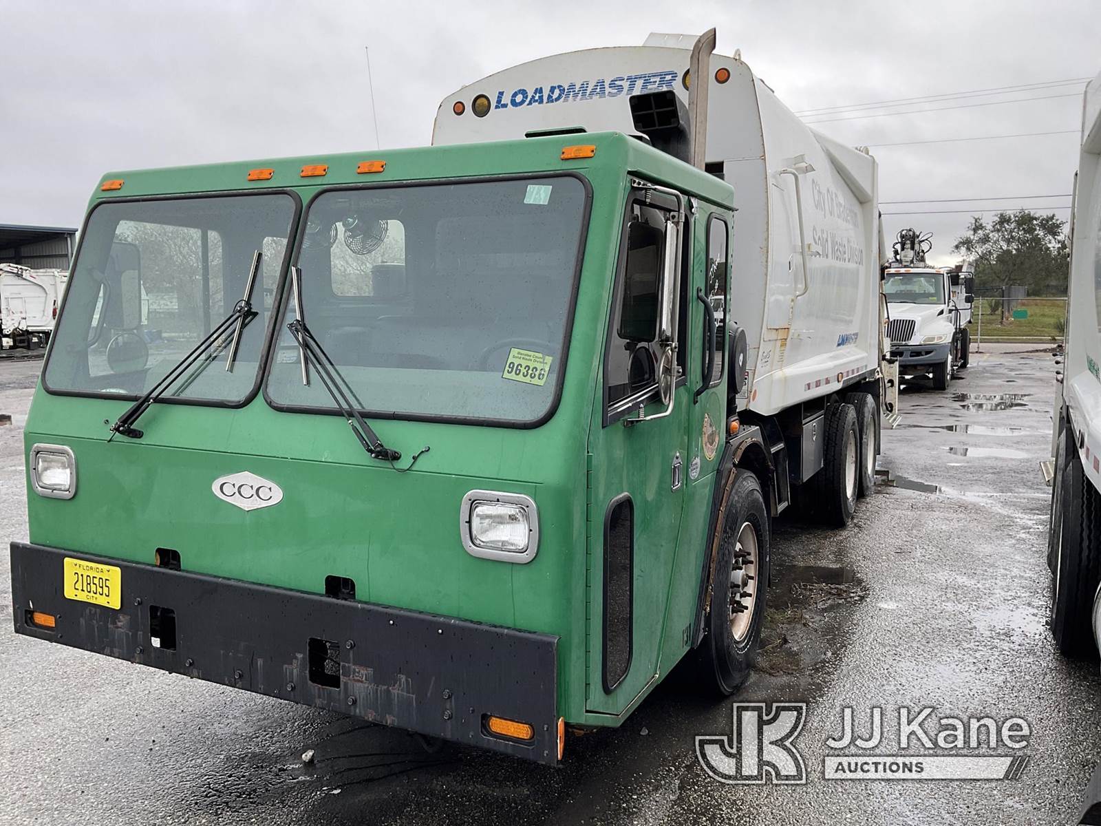 2010 Crane Carrier Co. Low Entry T/A Trash/Compactor Truck For Sale ...